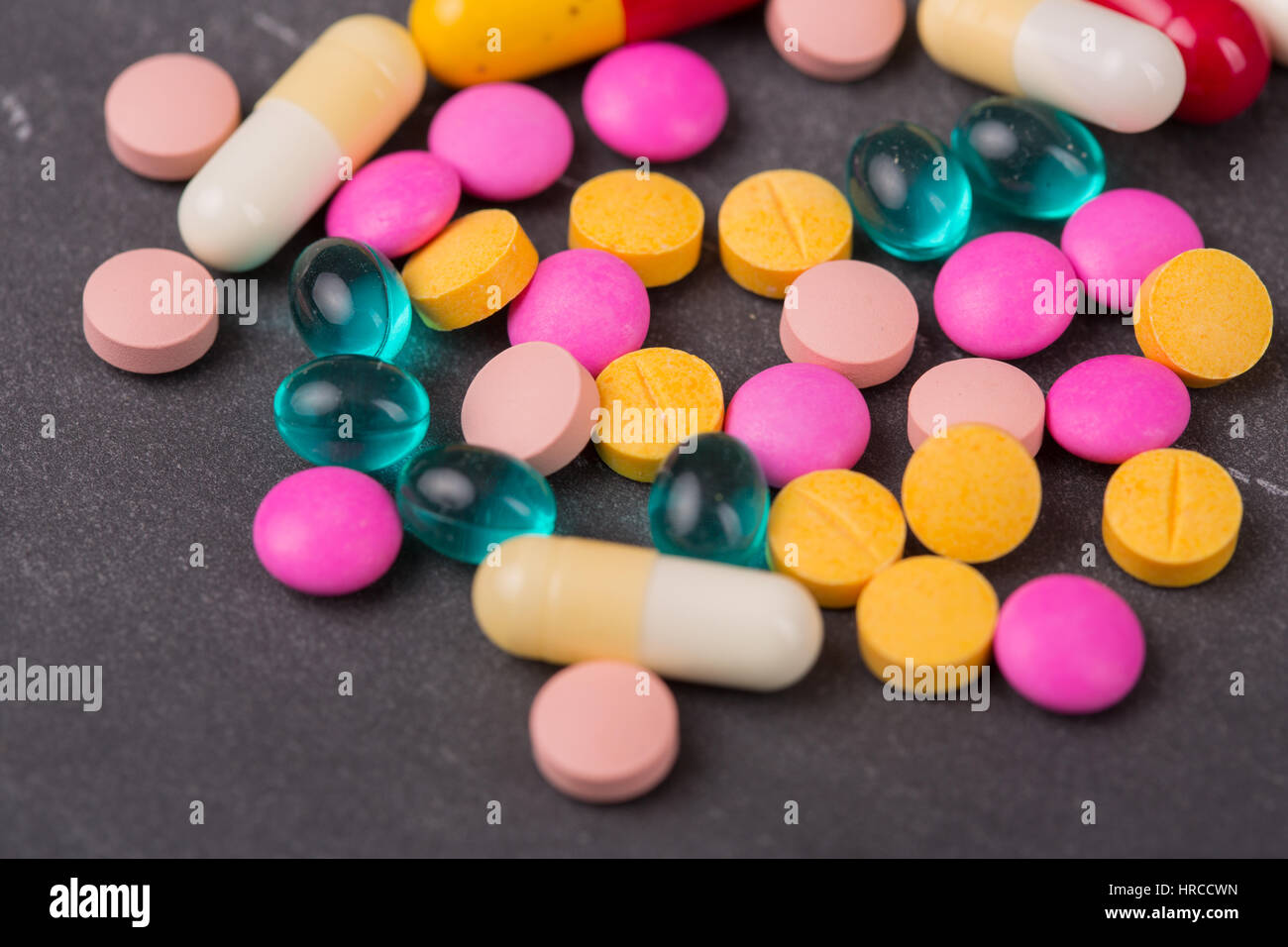 different tablets pills capsule heap mix therapy drugs Stock Photo - Alamy