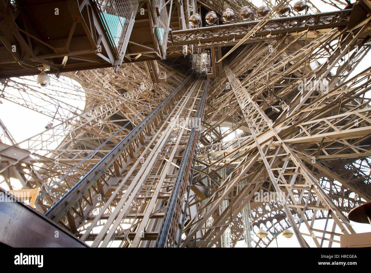 Looking up the interior of the Eiffel Tower, Paris, France showing ...