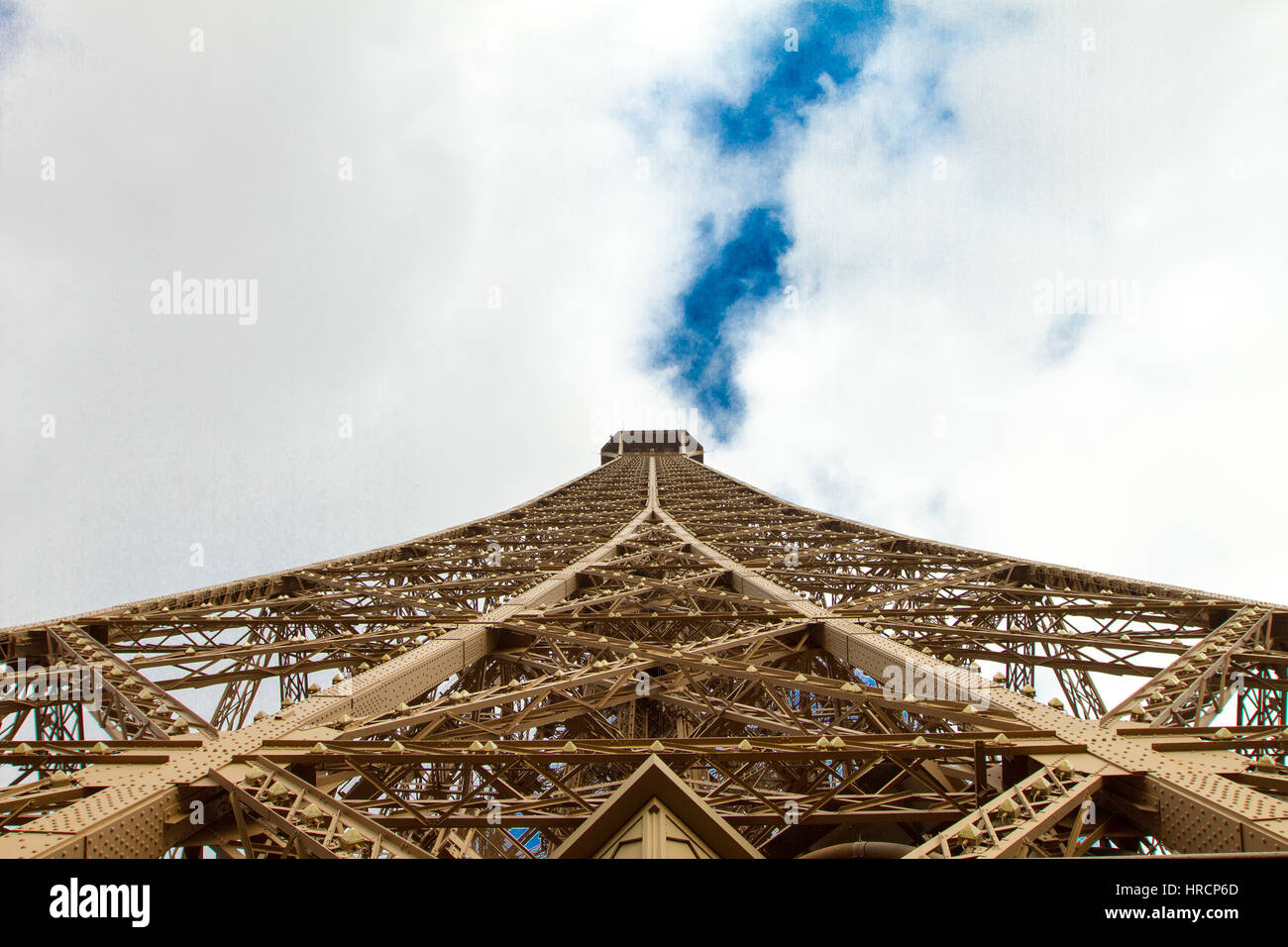 View looking up the wrought iron lattice framework from directly below ...