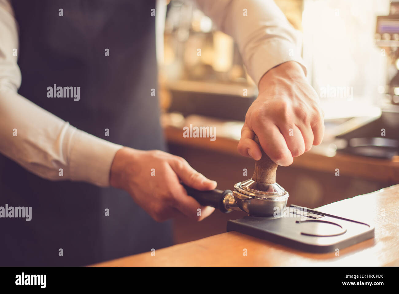 Man making espresso hi-res stock photography and images - Alamy