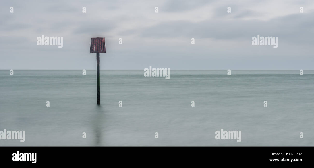 Solitary groyne marker Stock Photo - Alamy