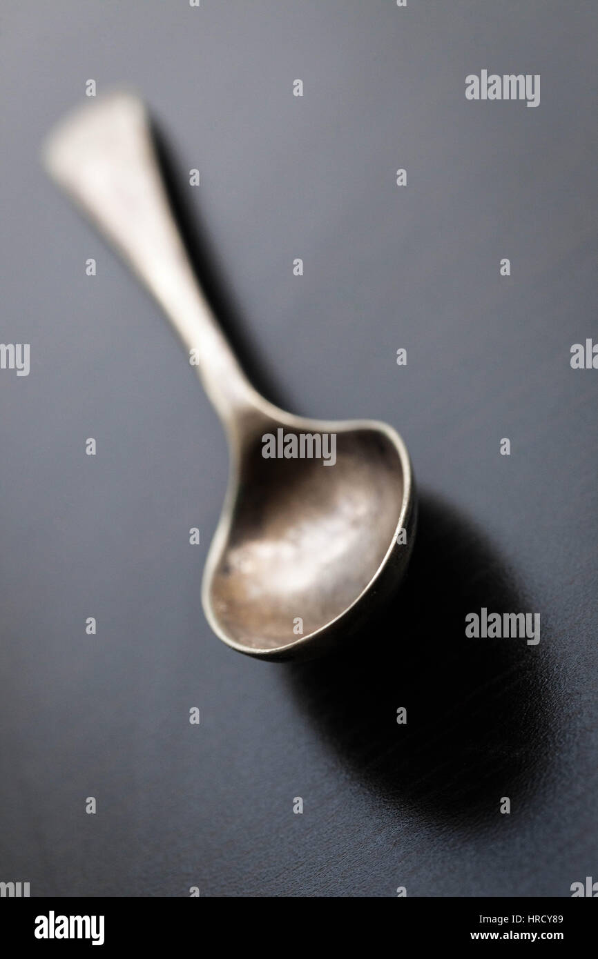 High angle view of a metal teaspoon Stock Photo - Alamy