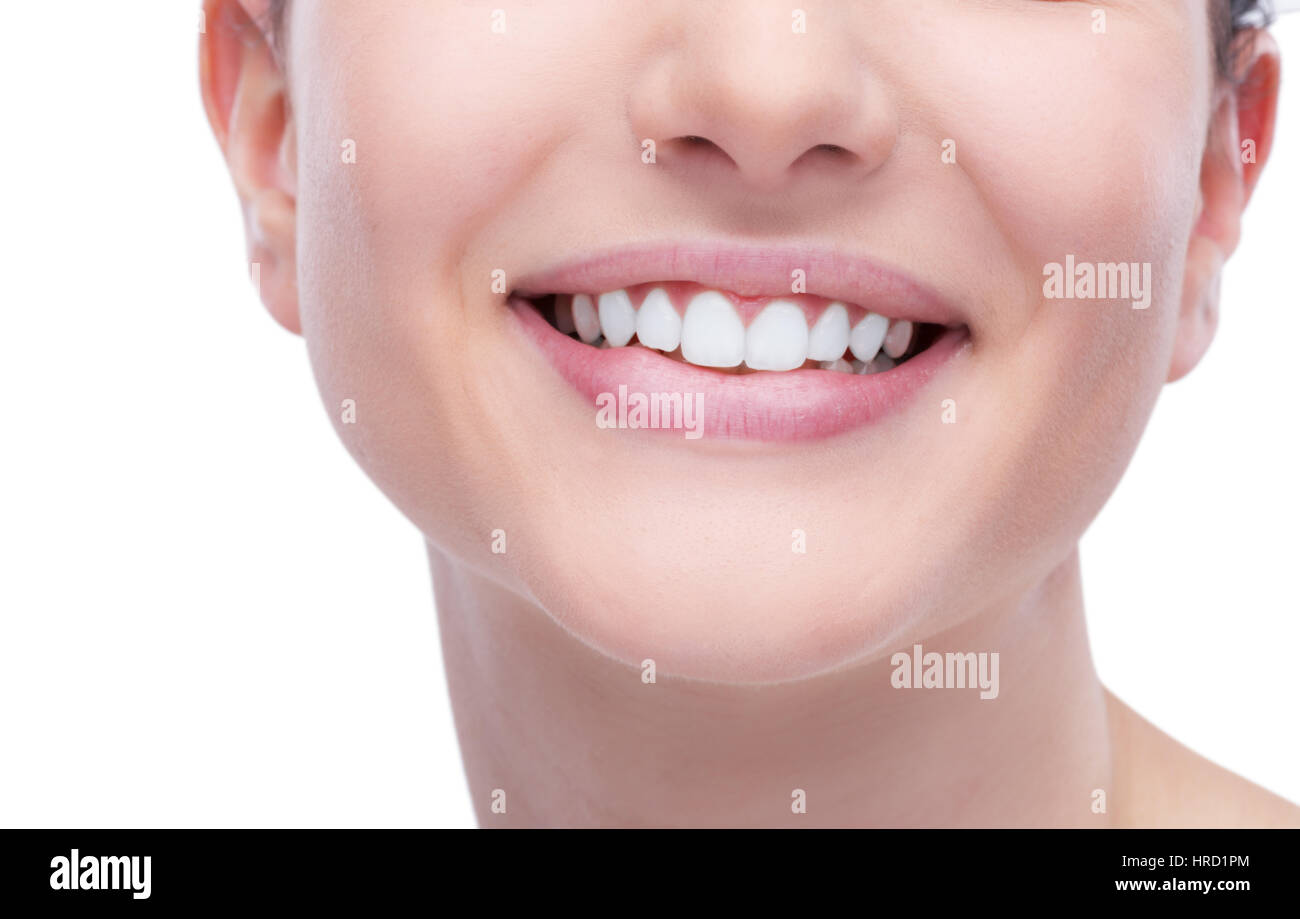Beautiful young woman smiling an showing perfect white healthy teeth ...