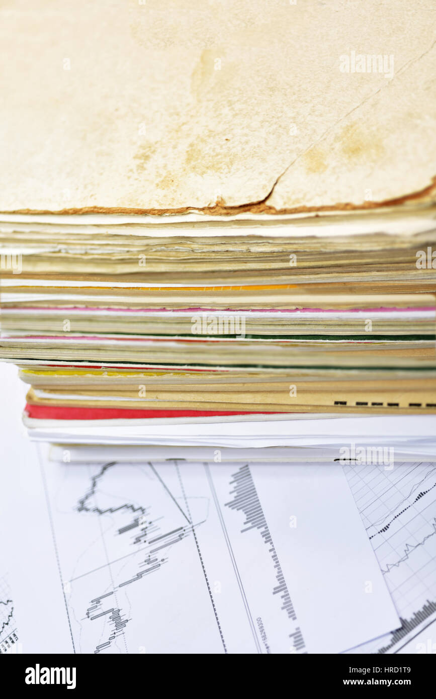 Old documents on table. Isolated on white background Stock Photo - Alamy