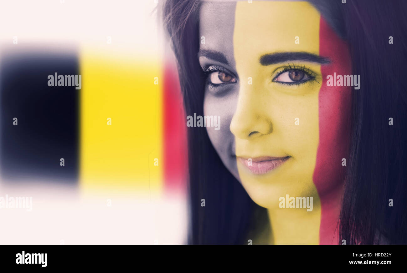The flag of Belgium on the face of a smiling woman. / Color effects and ...