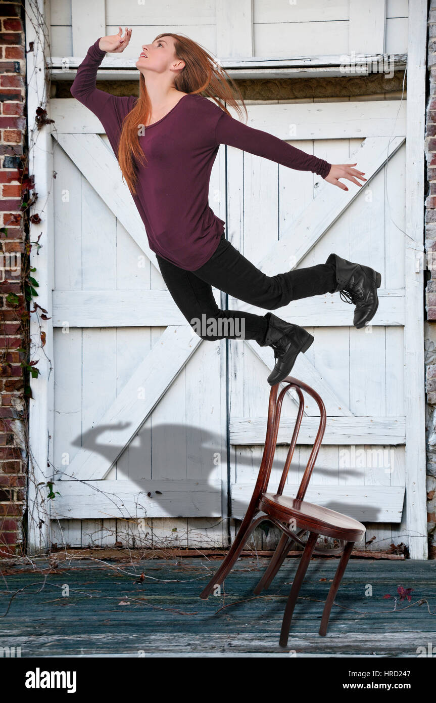 Beautiful woman as she slips trips and falls Stock Photo - Alamy