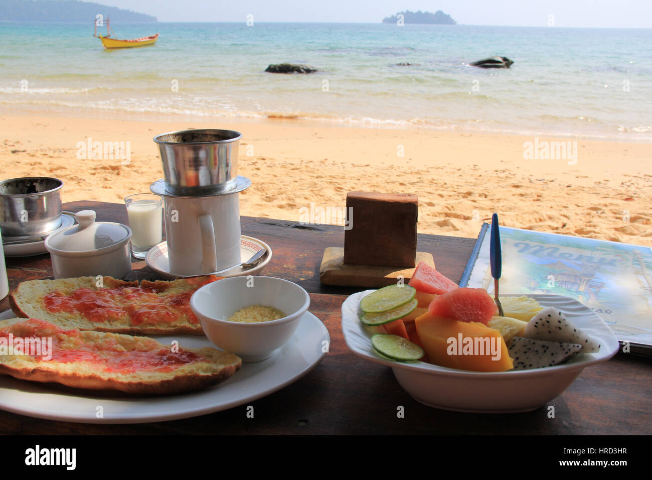 Cambodian breakfast on the beach Stock Photo - Alamy
