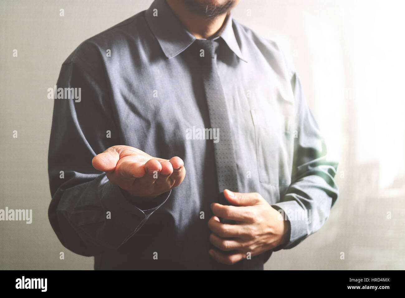 success businessman open his hand,front view,filter effect Stock Photo ...