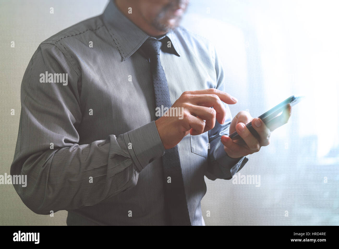 success businessman using smart phone ,front view,filter effect Stock ...