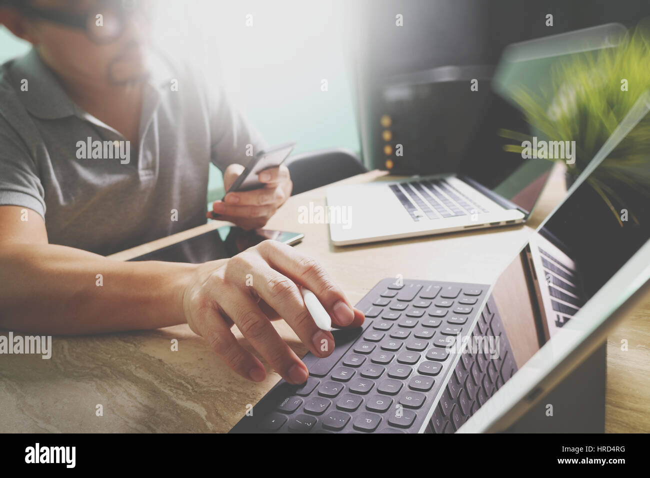 Outsource Developer working on marble Desk Working Laptop Computer ...