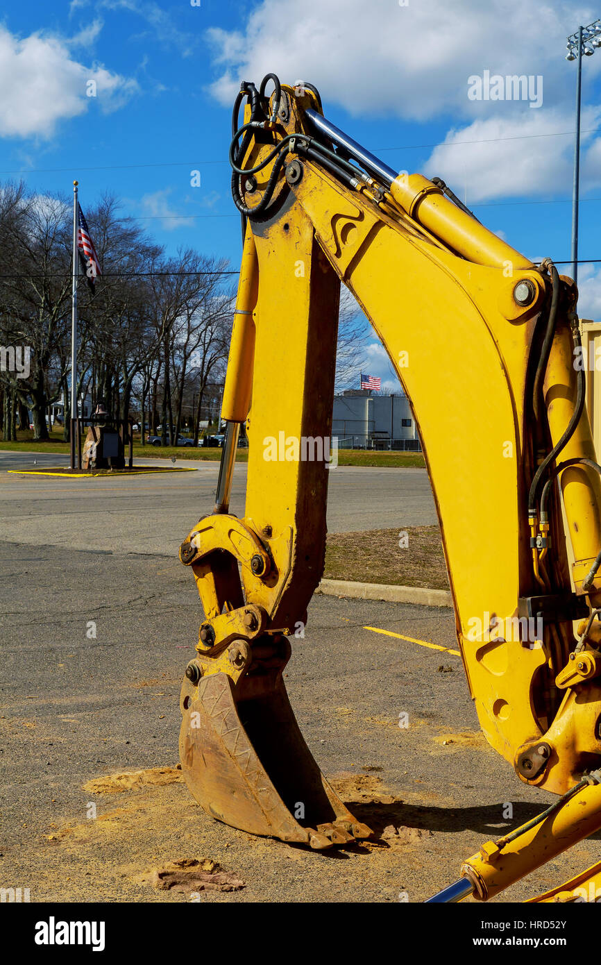 Excavator standing in sandpit with raised bucket cloudscape sky Stock ...