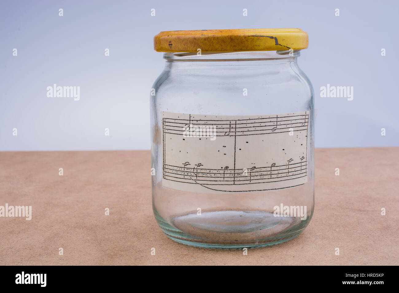 Empty bottle with some musical notes on it Stock Photo - Alamy
