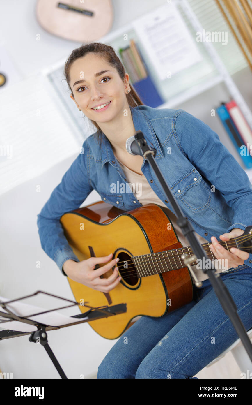 teen boy musician playing on acoustic guitar Stock Photo - Alamy