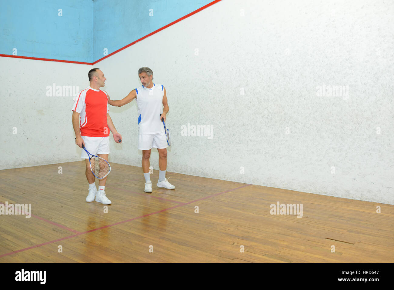 men playing squash Stock Photo - Alamy