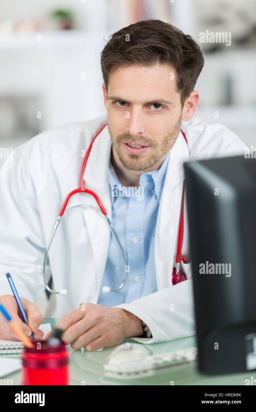 portrait of doctor at work in the office Stock Photo - Alamy