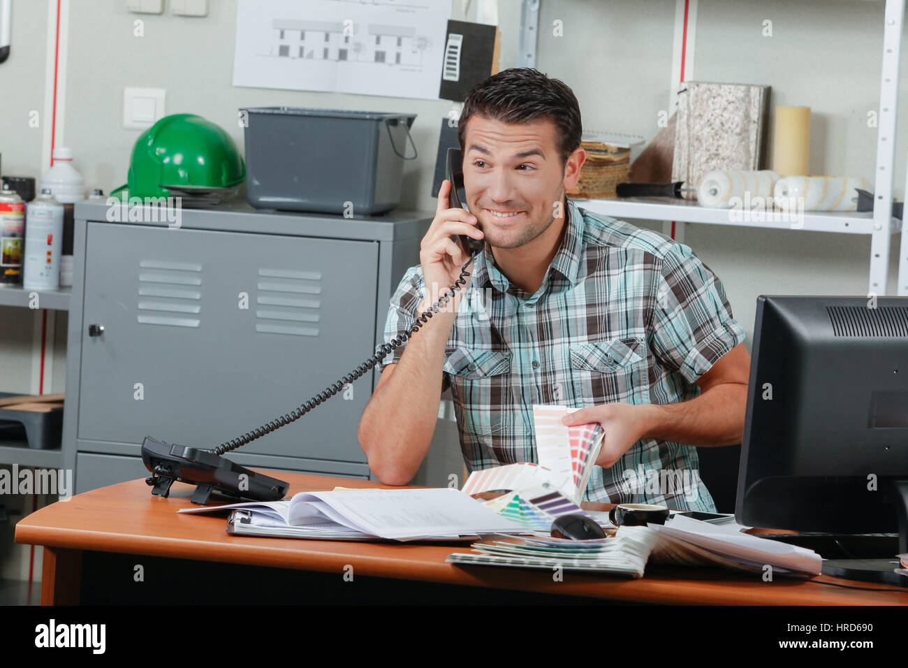 Office worker receiving exciting news Stock Photo - Alamy