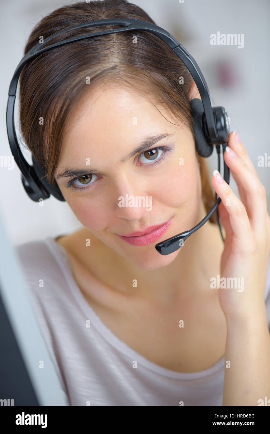 Female telephone sales worker Stock Photo - Alamy