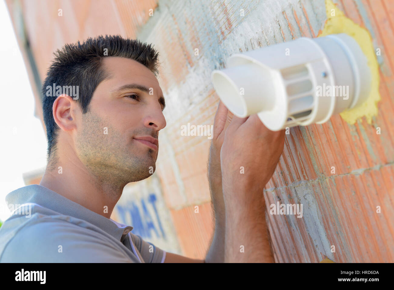 Fitting an extraction unit Stock Photo - Alamy
