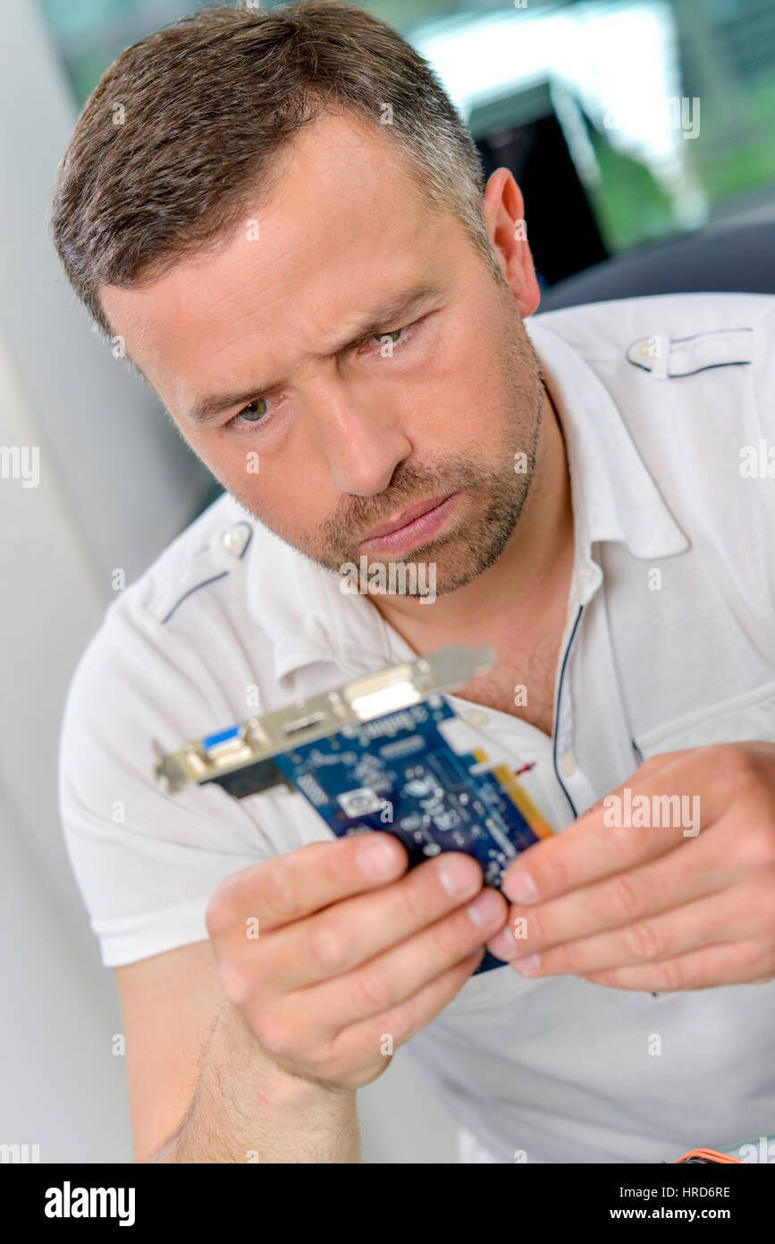 Man looking computer component hi-res stock photography and images - Alamy