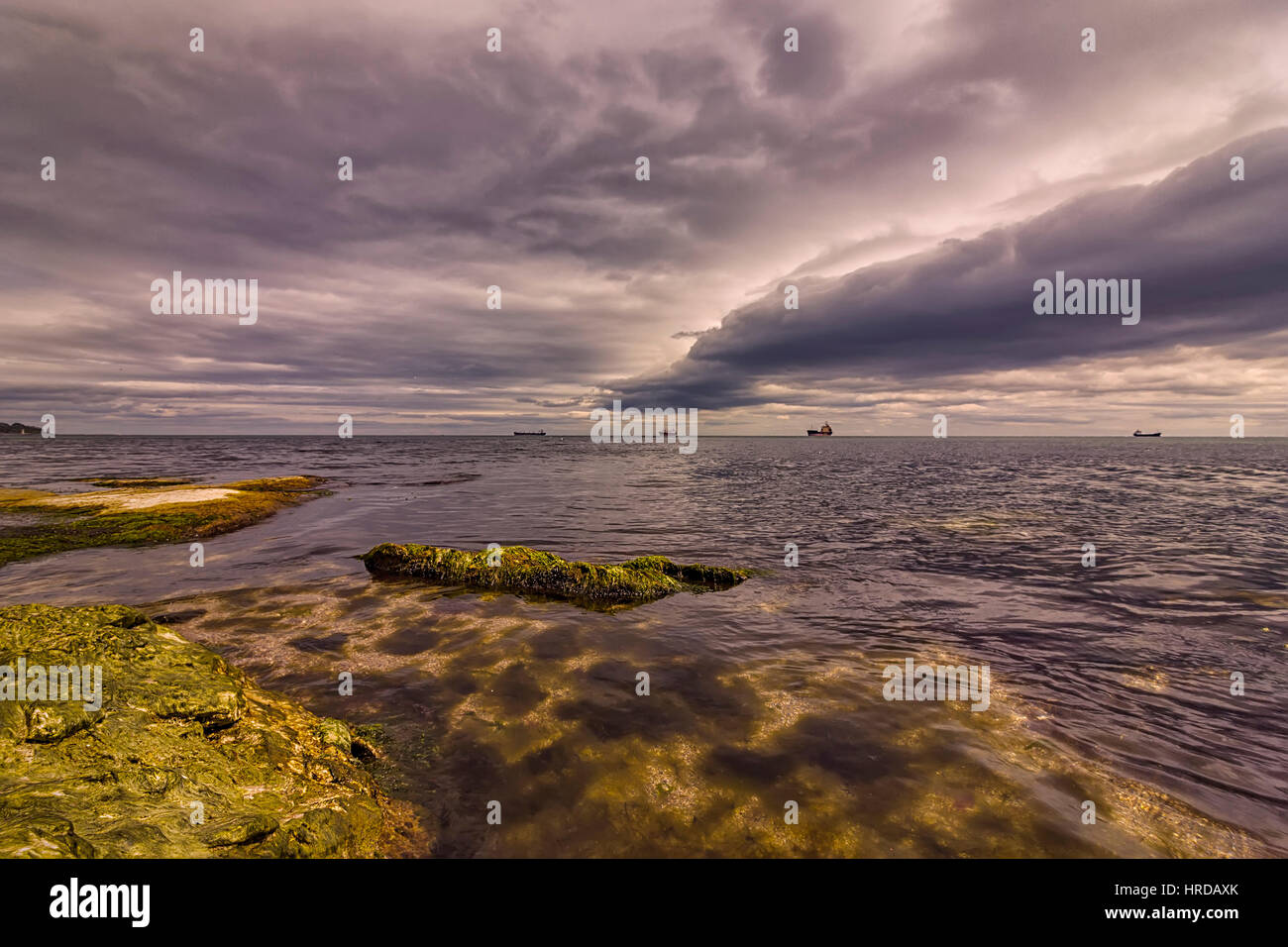 Exciting long exposure day seascape with stormy clouds Stock Photo - Alamy