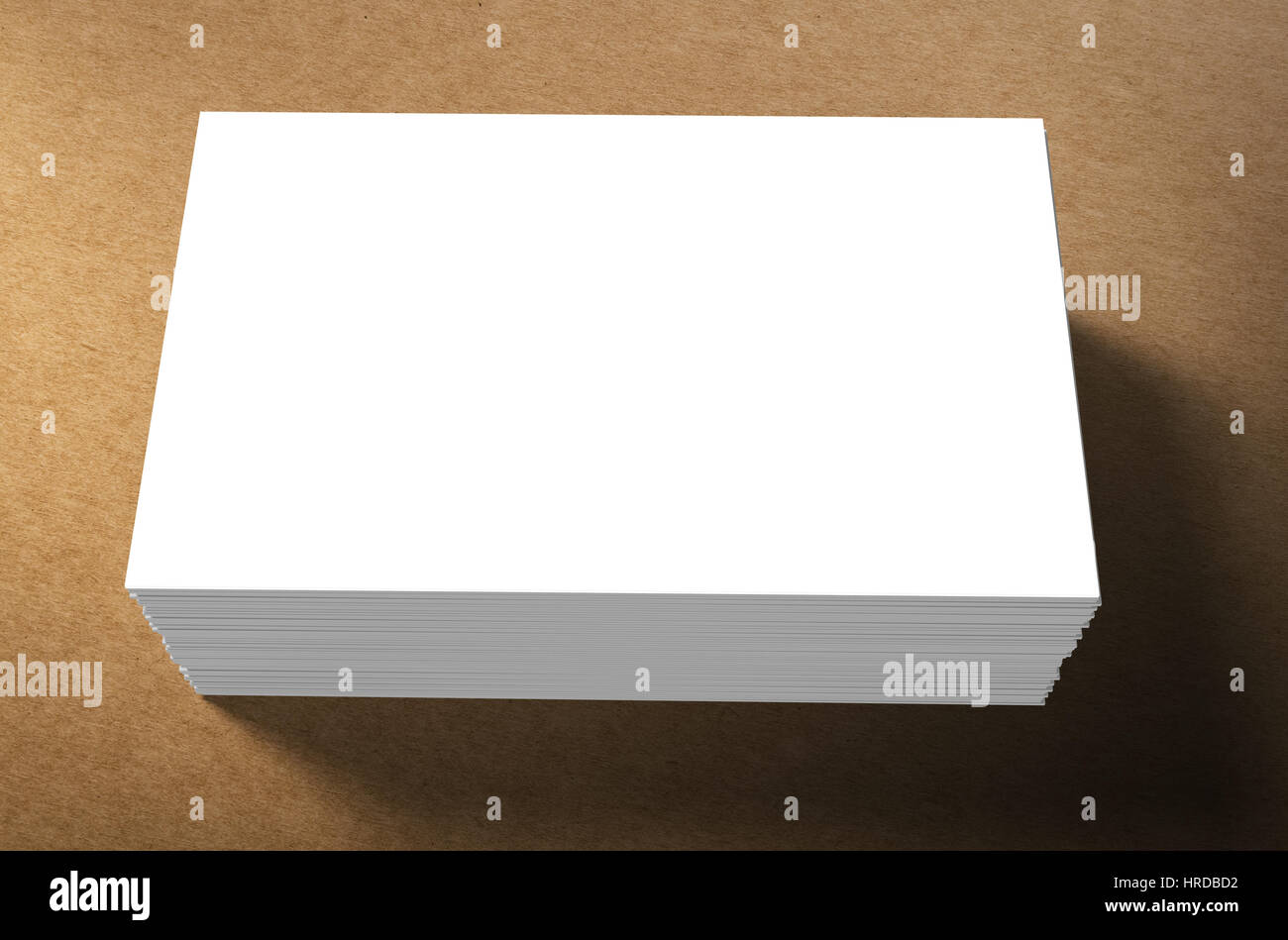 stack of blank name cards on brown background Stock Photo - Alamy