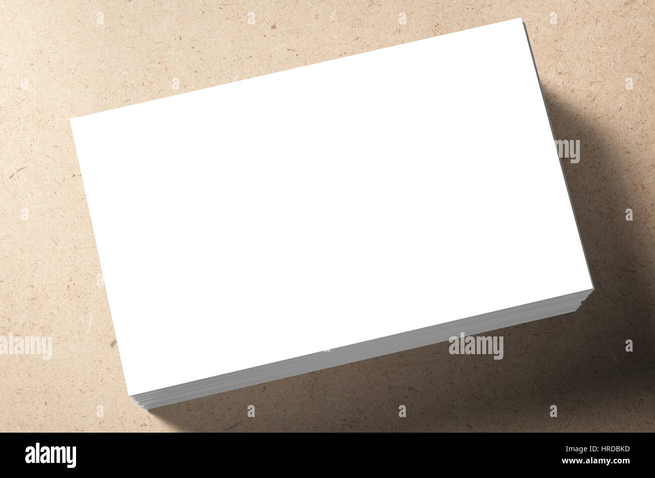 stack of blank name cards on brown background Stock Photo - Alamy