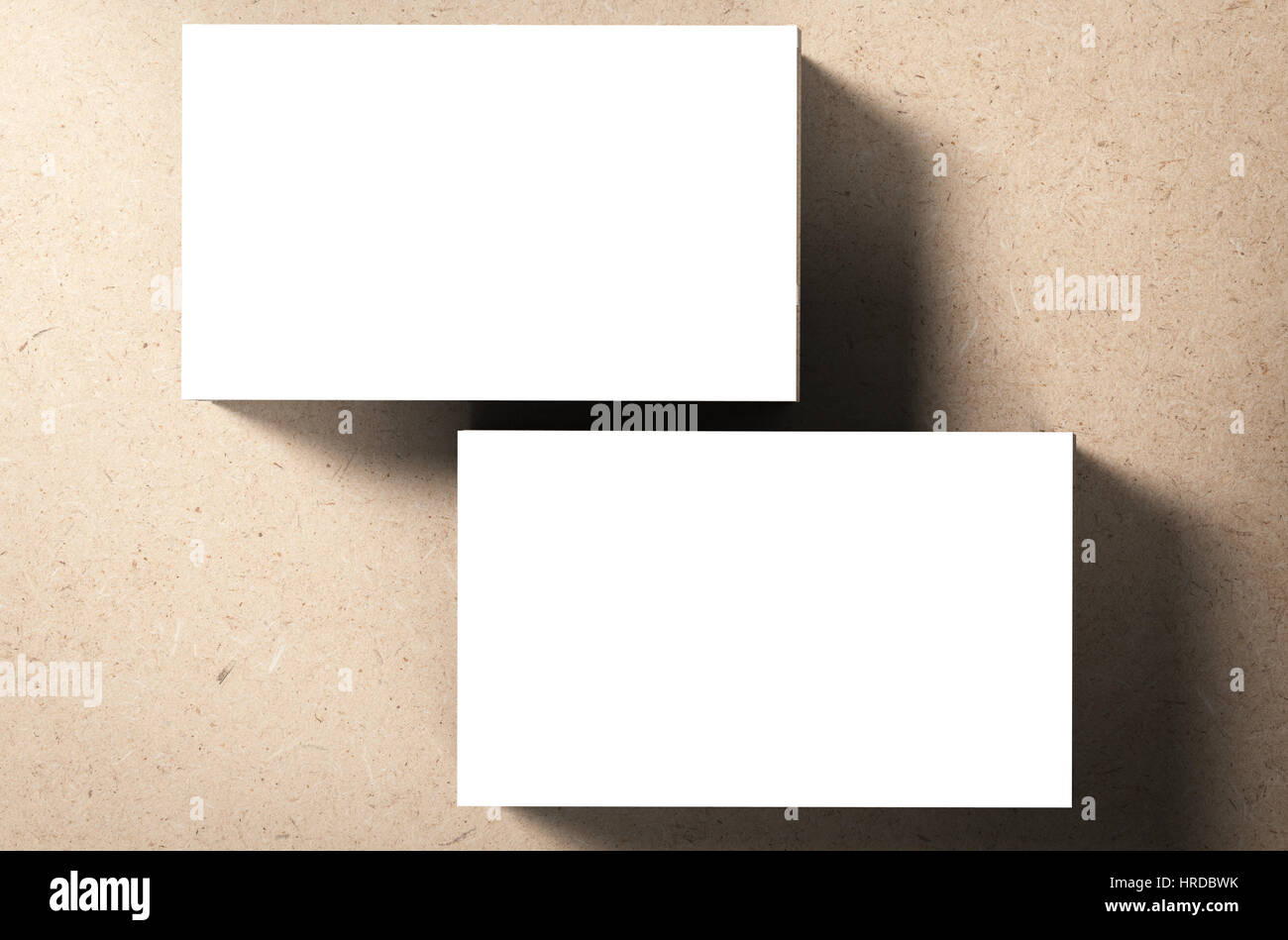 stack of blank name cards on brown background Stock Photo - Alamy