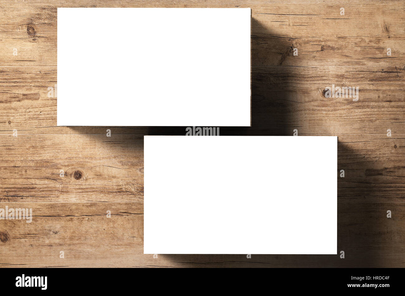 stack of blank name cards on wooden background Stock Photo - Alamy