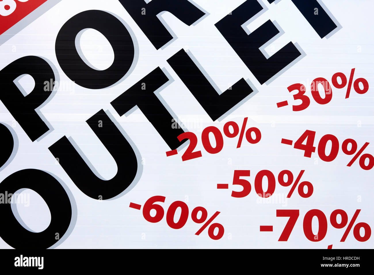 signs on shop window indicate sale and discount percentages Stock Photo ...