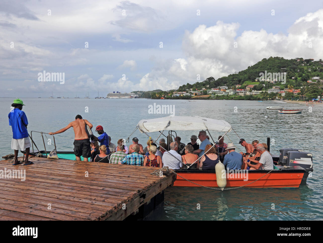 Passengers boarding Water Taxi at Grand Asne, Grenada Stock Photo - Alamy