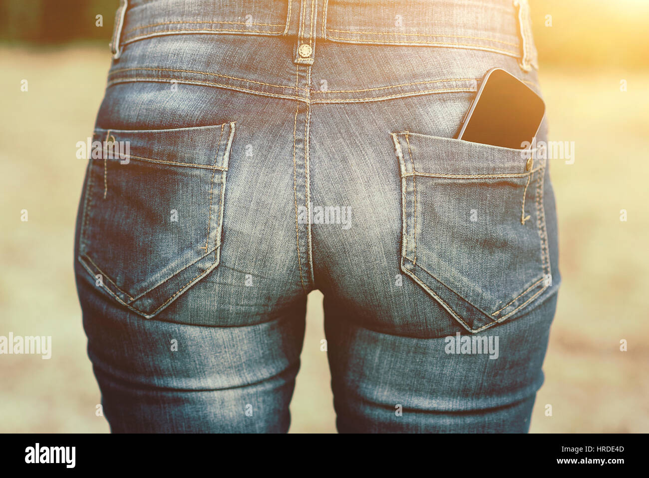 Mobile phone in the pocket Stock Photo - Alamy