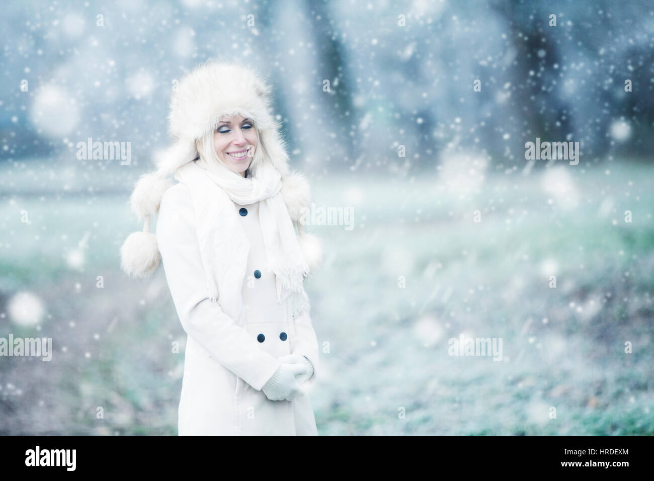 Portrait of a woman in winter in snow Stock Photo - Alamy