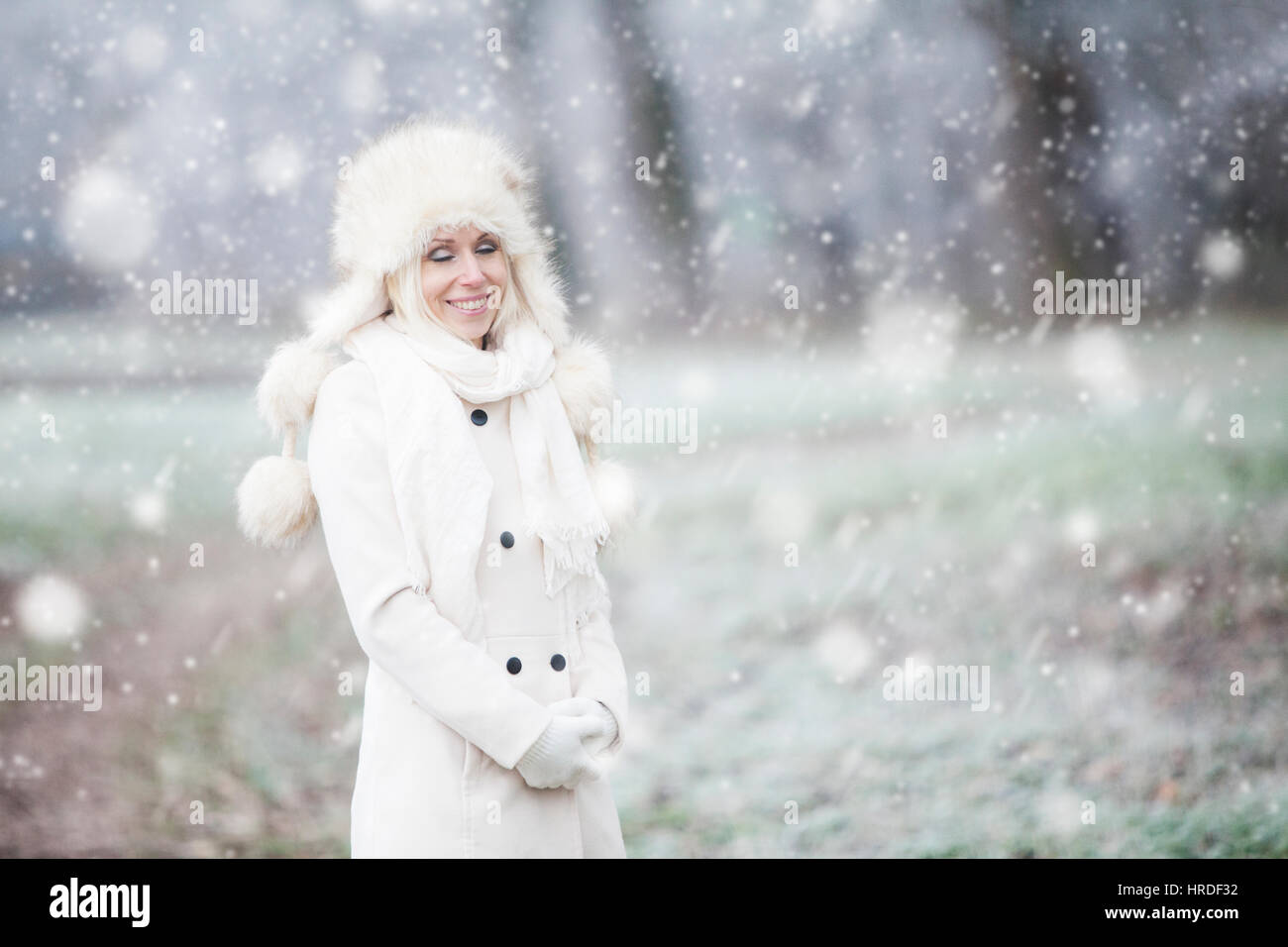 Portrait of a woman in winter in snow Stock Photo - Alamy