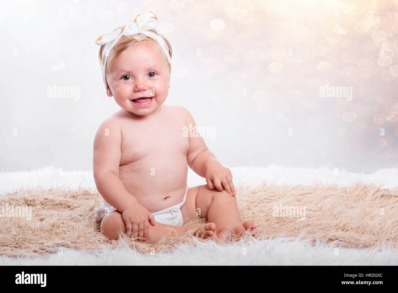 Happy baby, smiling baby in diaper Stock Photo - Alamy