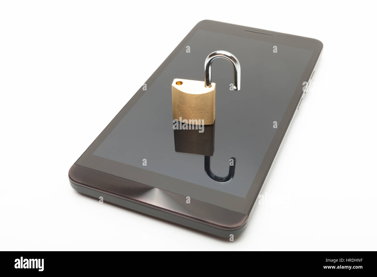 Small lock in unlocked position over a smartphone. Mobile phone ...