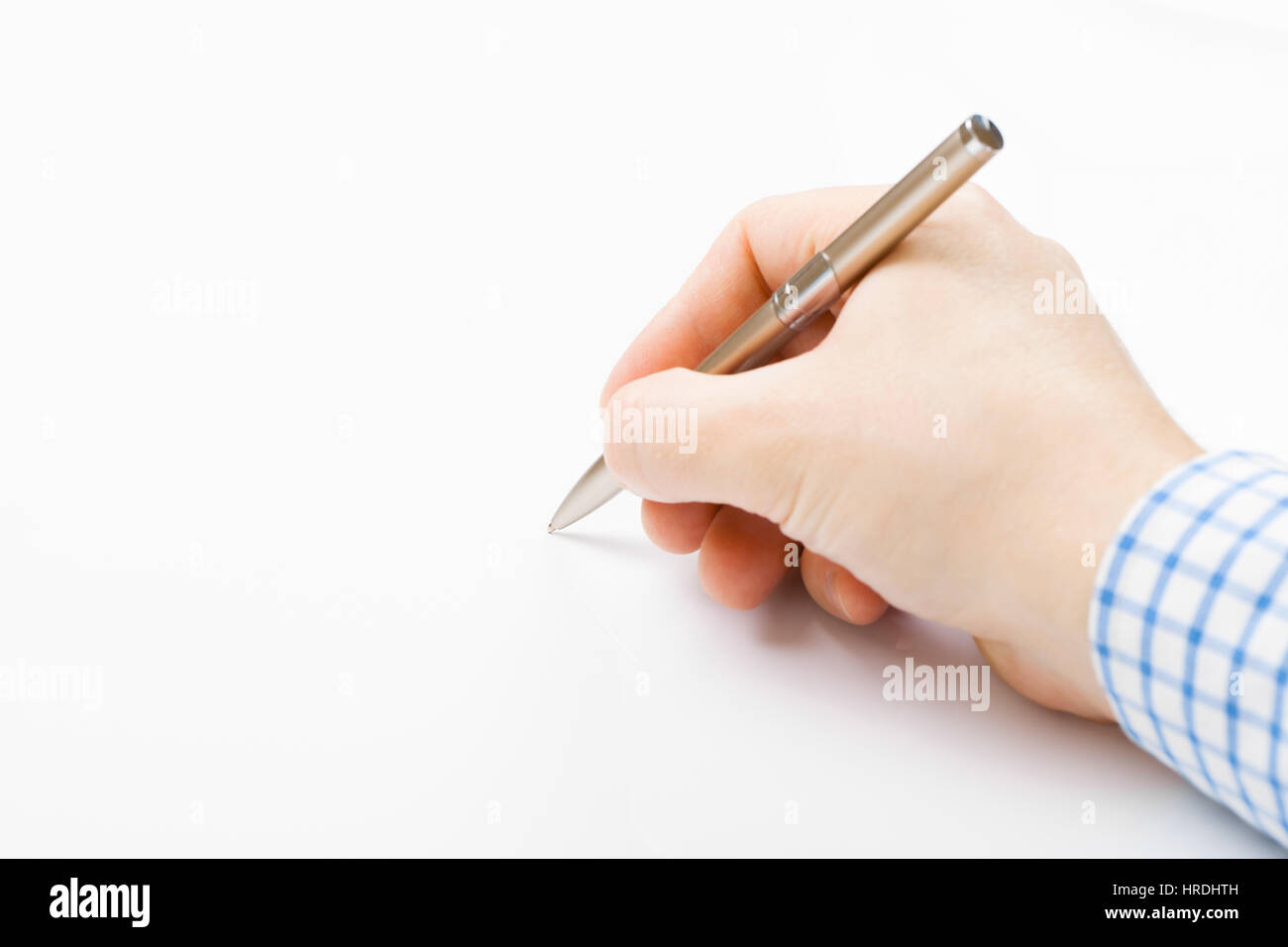 Man signing or writing something - close up studio shot Stock Photo - Alamy