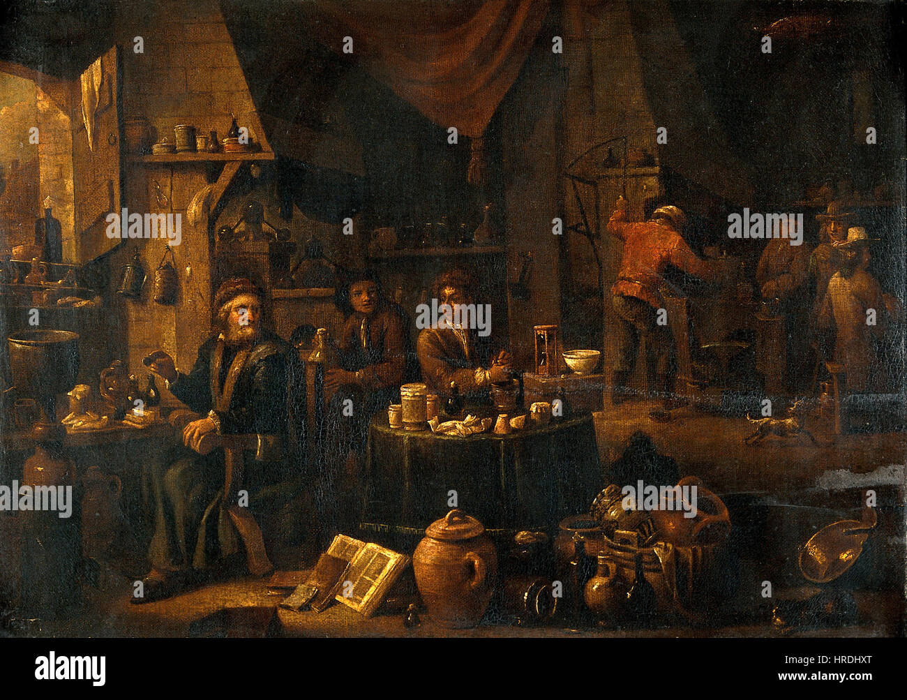 An alchemist in his laboratory. Oil painting by a follower o Wellcome ...