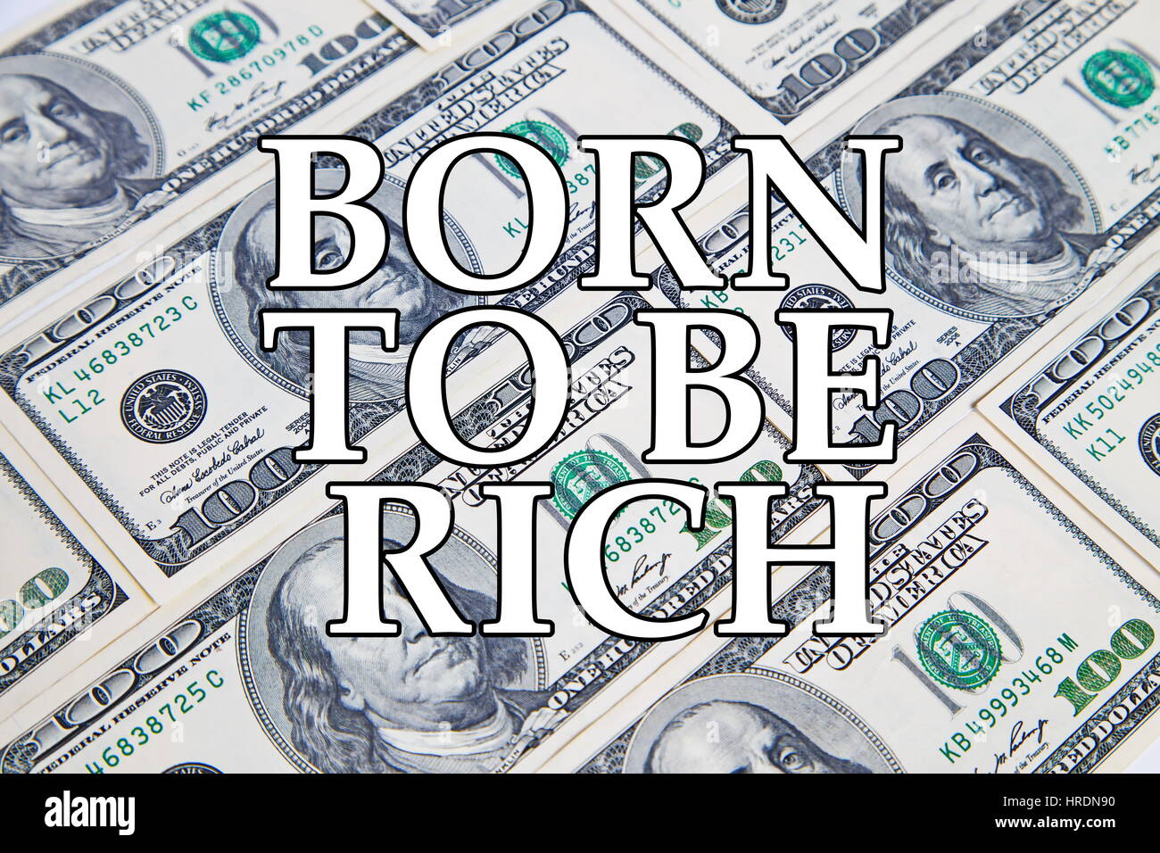 Dollar background with message BORN TO BE RICH Stock Photo - Alamy