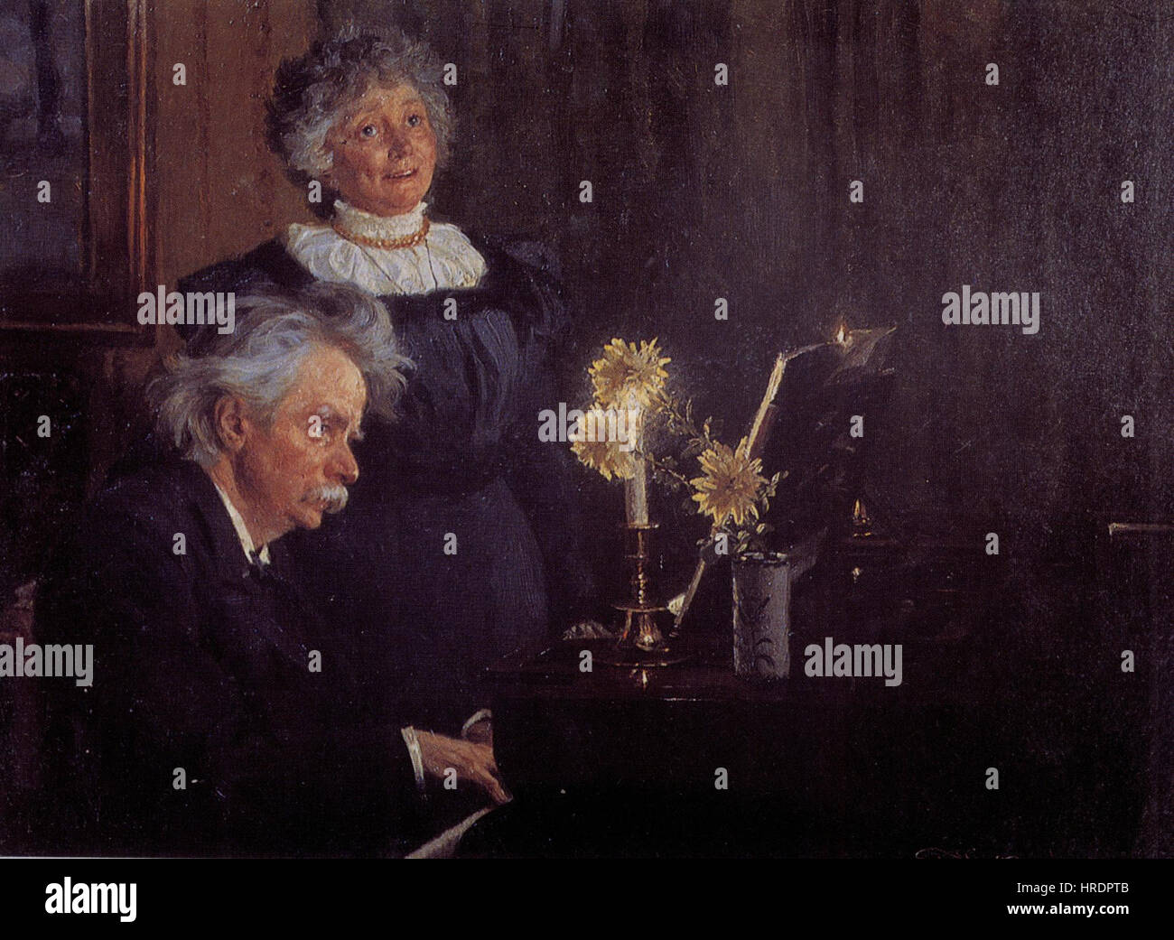 A photograph of Edvard Grieg accompanying his wife, showing the ...