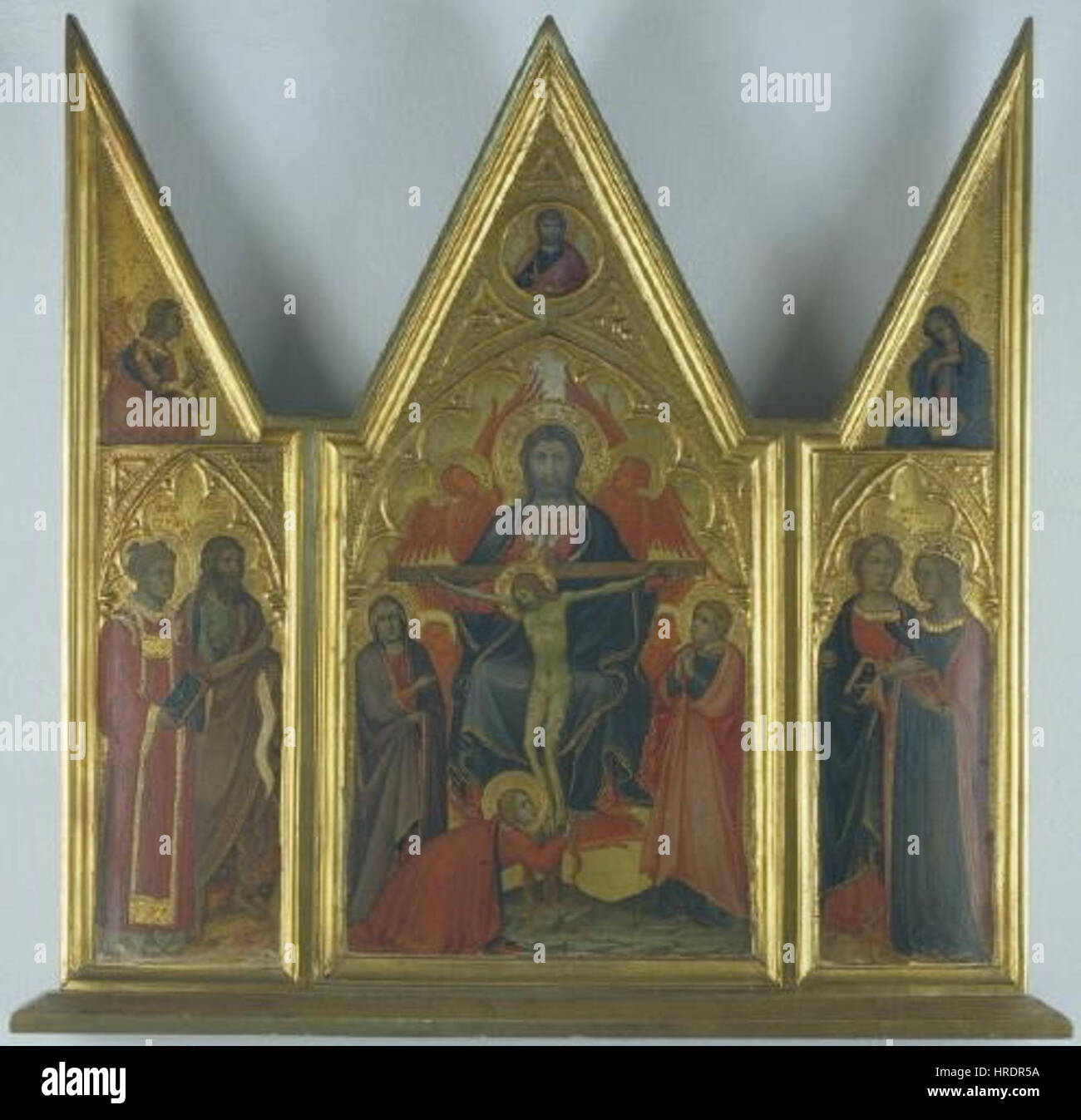 This 14th-century triptych by Andrea di Bartolo depicts the Holy Trinity, a central theme in ...
