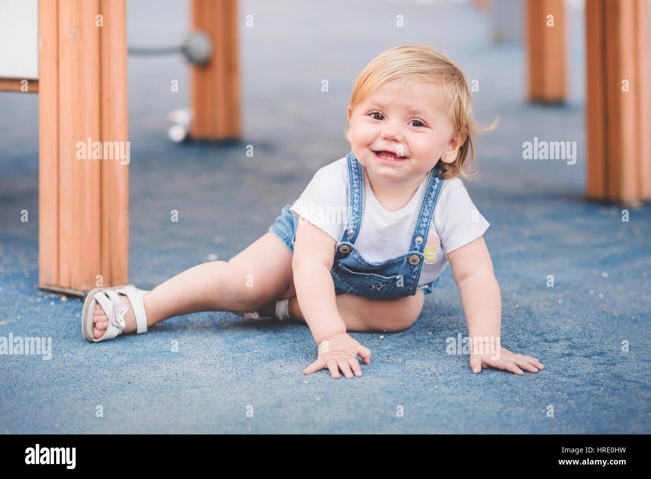 little baby on playground Stock Photo - Alamy