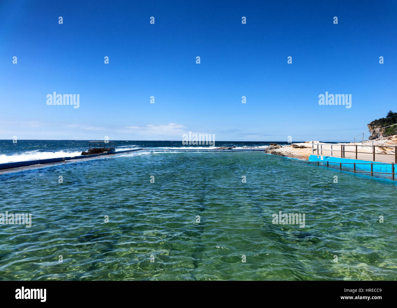 Front view of a rock swimming pool going into the Pacific Ocean Stock ...