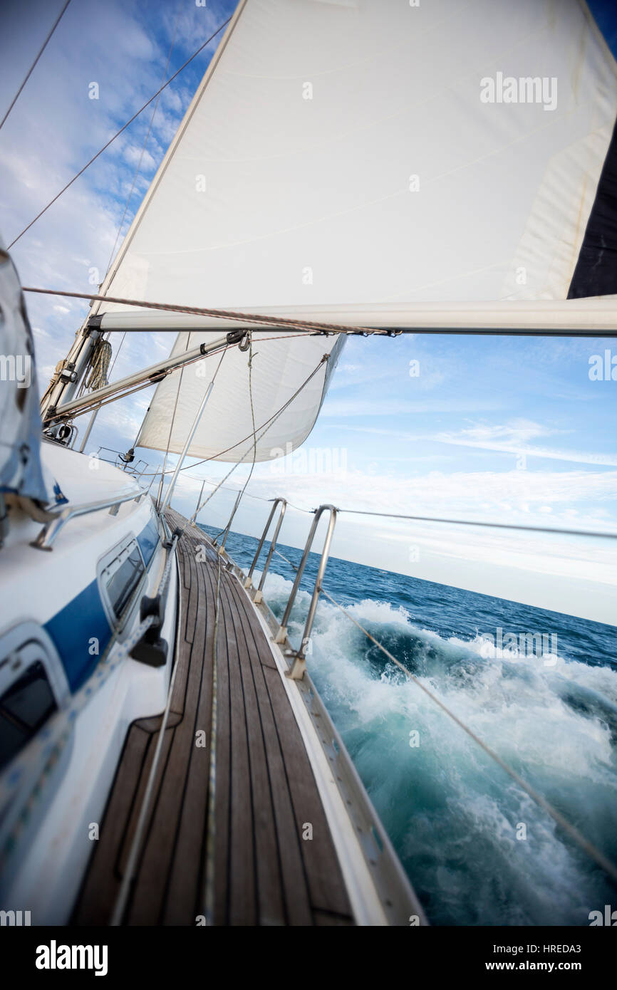 Luxury sail boat sailing on open sea Stock Photo - Alamy
