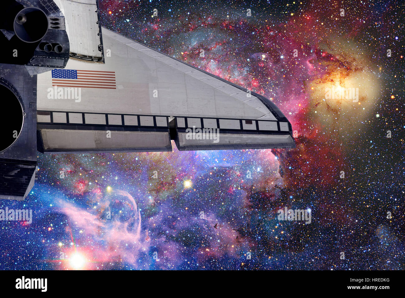 Space Shuttle over galaxy and space nebula. Elements of this image ...