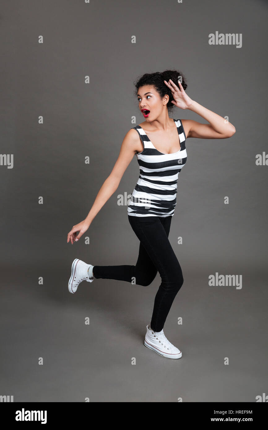 Woman running away danger hi-res stock photography and images - Alamy