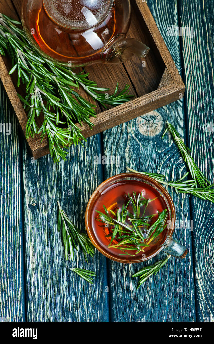 rosemary tea in cup and on a table Stock Photo - Alamy