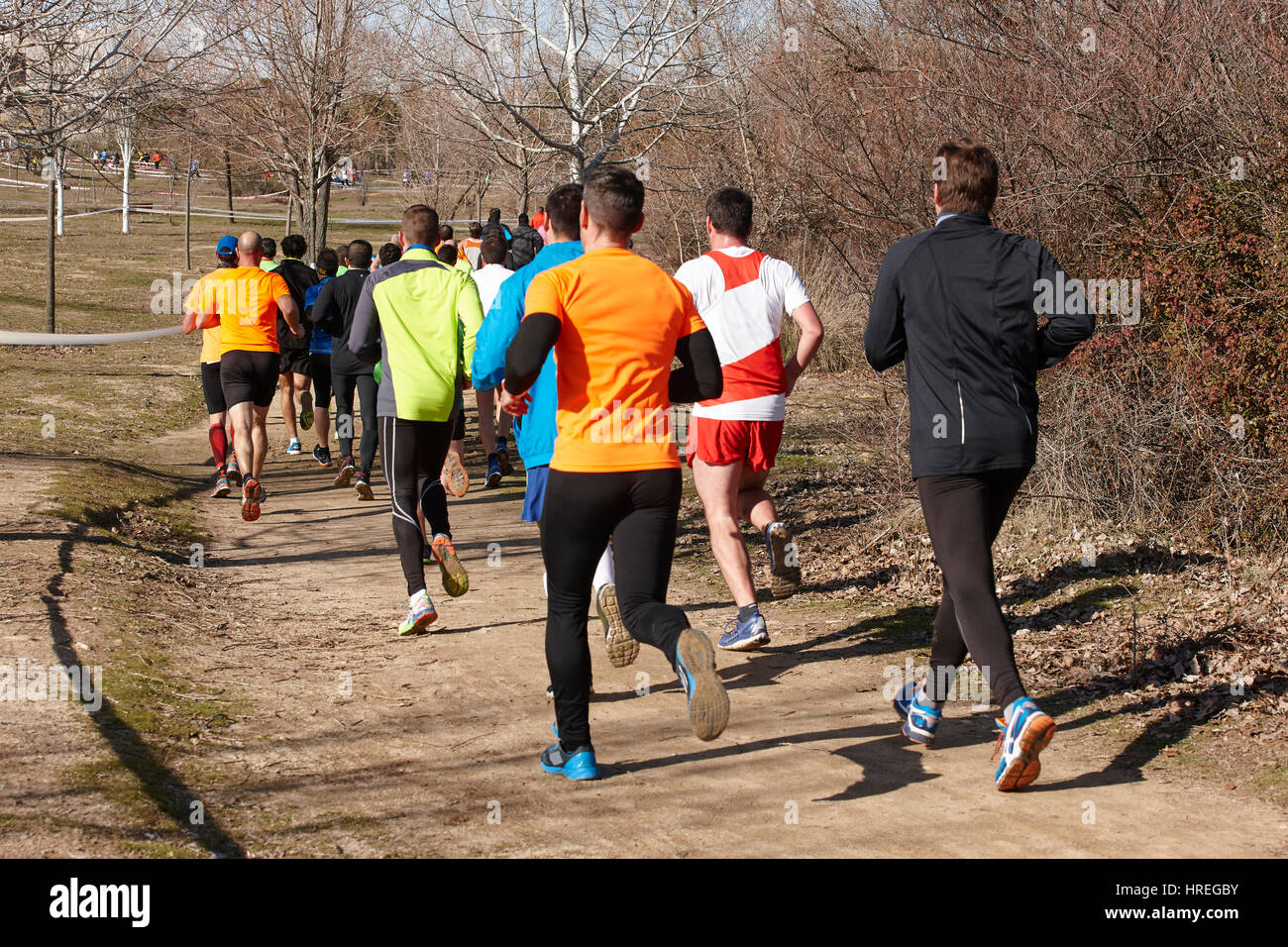 Runners running race men grass hi-res stock photography and images - Alamy