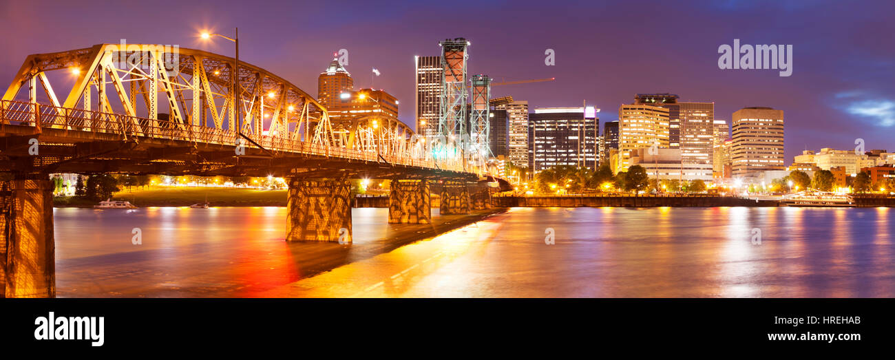 The skyline of Portland, Oregon at night. Photographed from across the ...