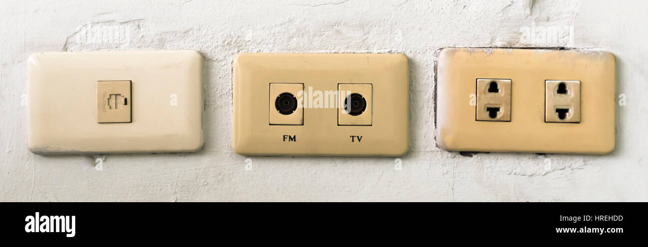 Multiple socket on the wall Stock Photo - Alamy