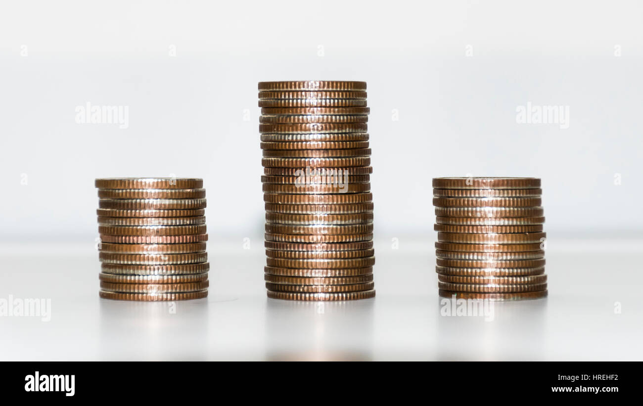 Three of standing coin on the white background Stock Photo - Alamy